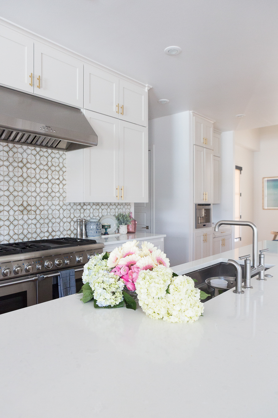 Affordable Ceramic Patterned Tile Backsplash and Flooring | CC and Mike|