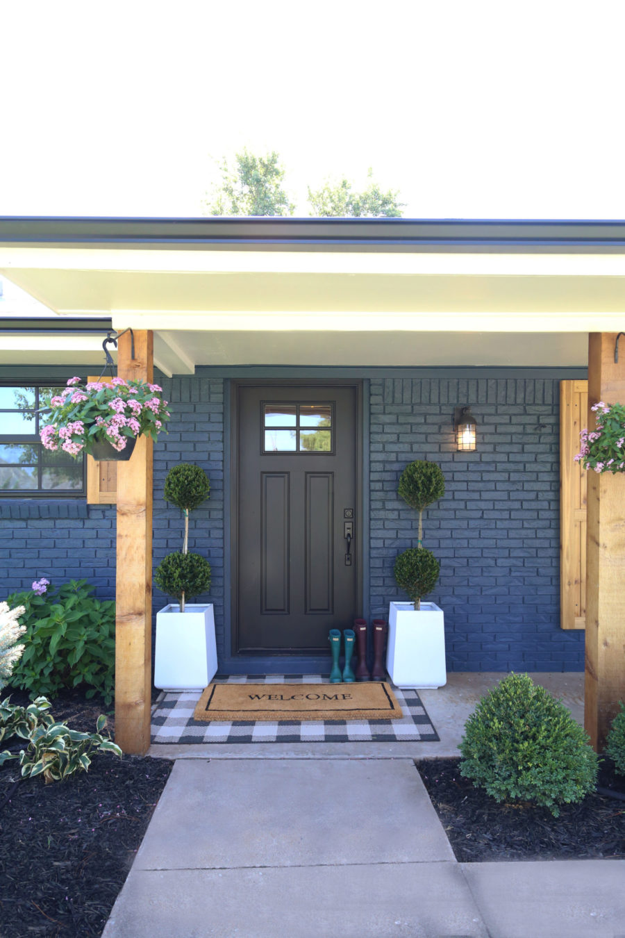 CC and Mike Modern Navy and Cedar Ranch Style Remodel navy brick with ...